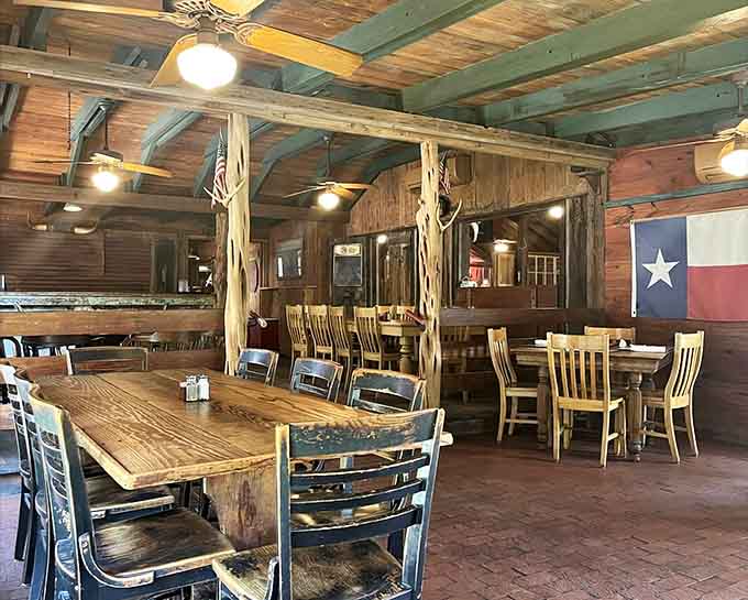 Dining room where the Texas flag watches over you, silently approving every delicious decision you're about to make.
