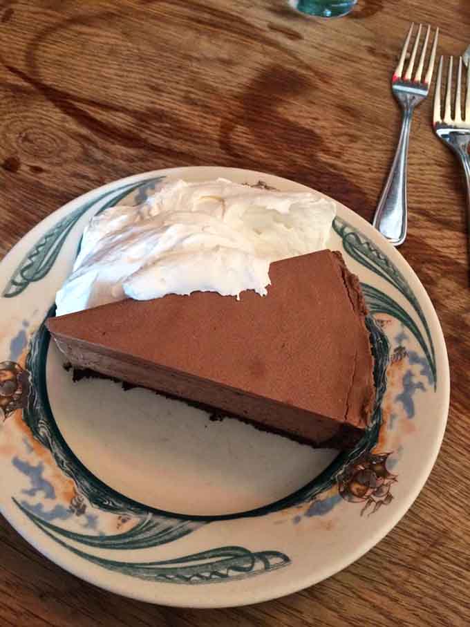 The chocolate mousse cake with schlag is how you end a legendary meal, sweet and satisfying without stealing thunder.