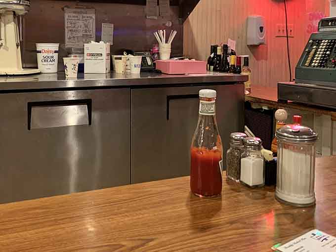 Ketchup, salt, pepper, and hot sauce at the ready, because great food deserves the right supporting cast.