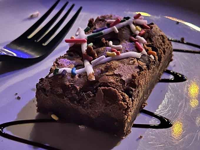 Chocolate brownie topped with sprinkles, because treasure isn't the only sweet reward you'll find at this adventure.