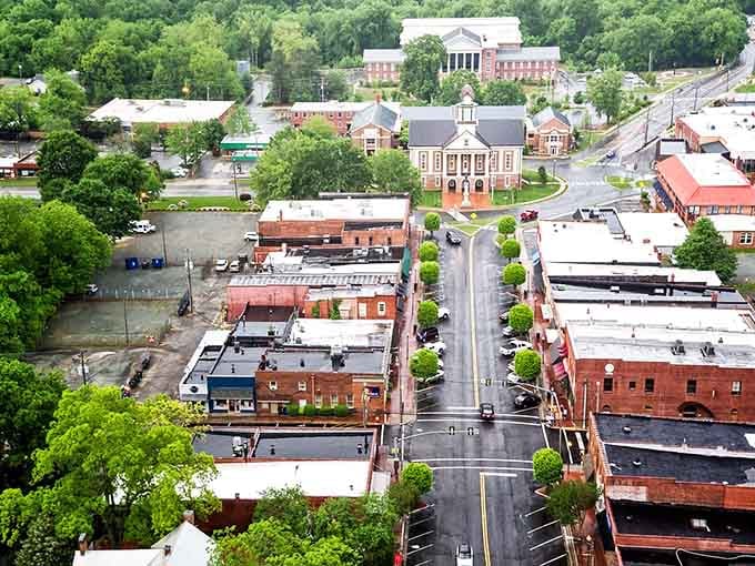 The aerial view reveals Pittsboro's compact charm, where everything you need lives within actual walking distance.