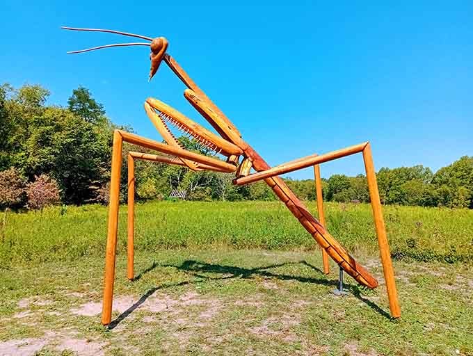 This oversized praying mantis sculpture proves that even insects deserve their moment in the artistic spotlight here.