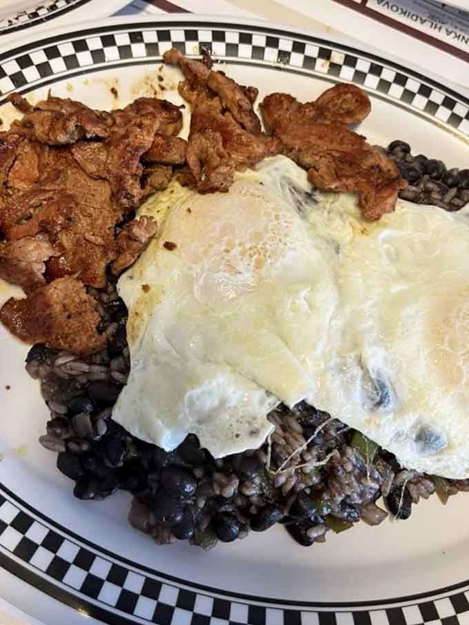 Black beans, rice, eggs, and steak create a hearty plate that laughs in the face of light lunches.