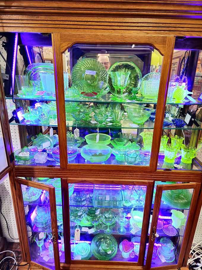 Depression glass glowing like emeralds under the lights, proving green is always in season for collectors everywhere.