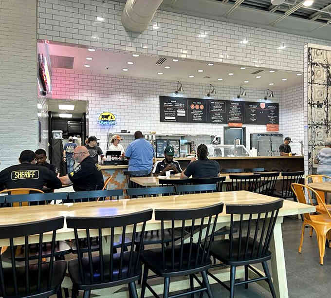 The casual counter-service setup means less waiting, more eating, and maximum barbecue enjoyment for everyone involved.