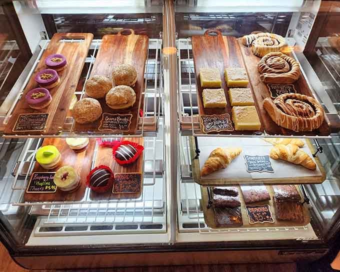 The bakery case displays fresh pastries and treats that make waiting for your sandwich almost bearable, almost.
