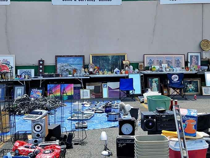 Vintage speakers, framed art, and random household goods create the kind of eclectic mix that interior designers charge thousands to curate.