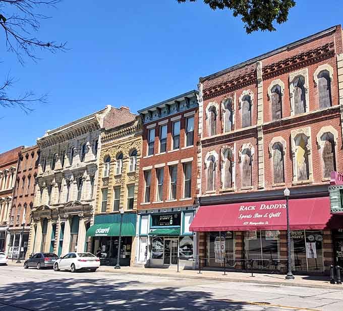 Downtown shops showcase the kind of architectural details that modern buildings forgot existed somewhere between efficiency and blandness.