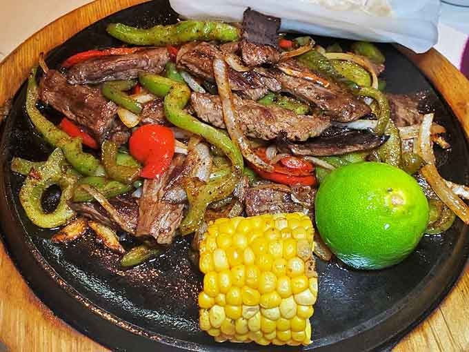 Steak fajitas that announce their arrival with authority, bringing peppers, onions, and perfectly seasoned meat to the party.