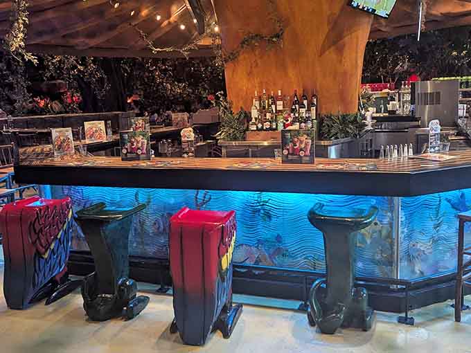Bar seating with an aquarium view because apparently fish like watching people eat as much as we do.