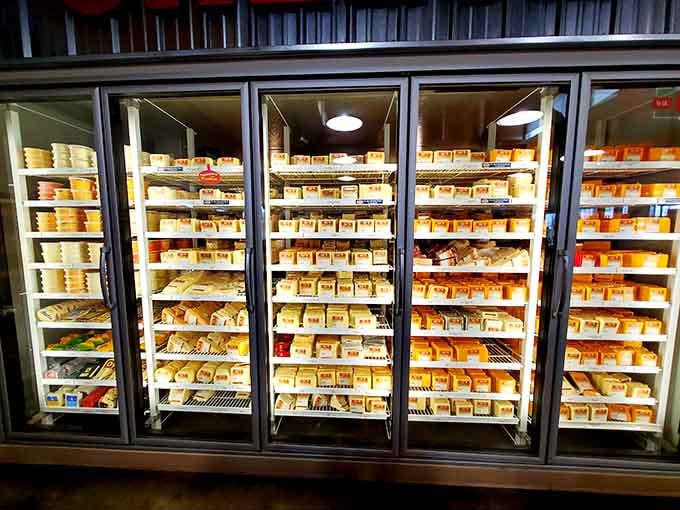 Wall-to-wall refrigerated cases stocked with endless cheese varieties&mdash;it's like a dairy library where every book is delicious.