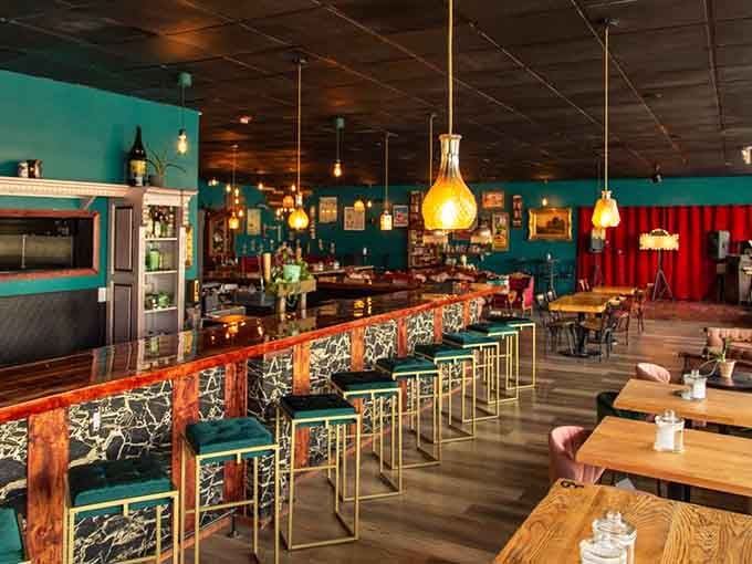 The bar area proves that reclaimed wood and craft beer cans can absolutely be considered fine art.