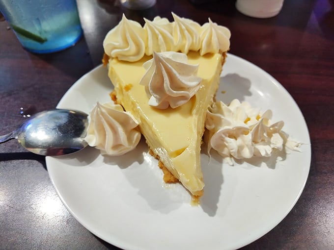 Key lime pie topped with swirls of meringue provides the sweet ending your grouper sandwich adventure deserves.
