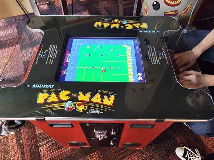 Pac-Man in cocktail table form, because sometimes the best gaming experiences happen at eye level with snacks nearby.