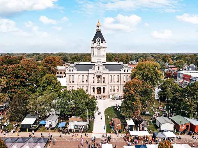 The Parke County Courthouse commands attention like a wedding cake designed by someone who really understood grandeur.