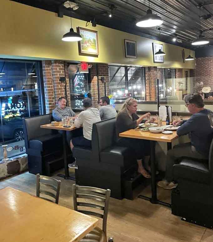 Real people enjoying real food in a space that actually feels like a restaurant, not a showroom.
