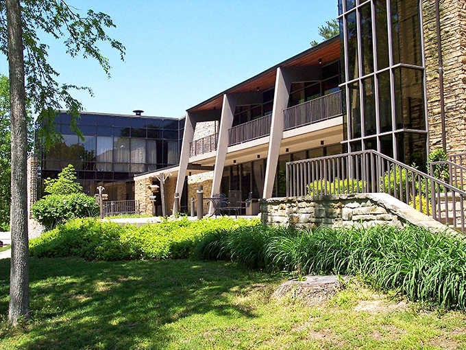 The lodge architecture blends stone and glass beautifully, creating a retreat that feels both modern and timeless simultaneously.