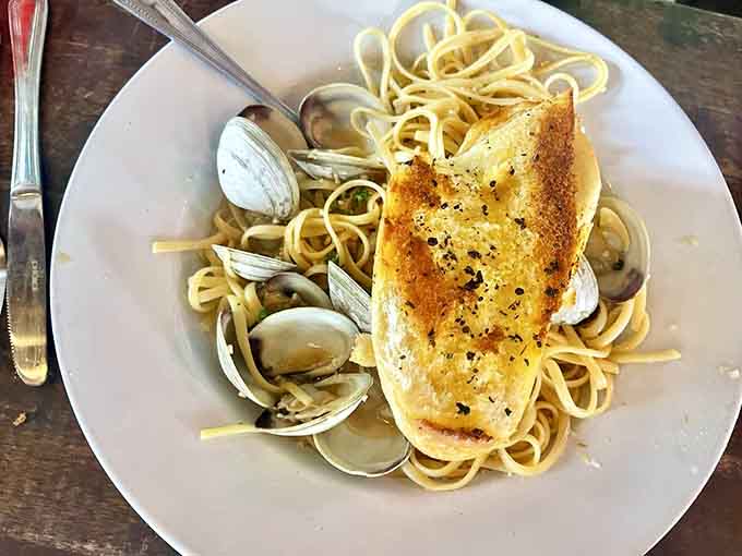 Linguine with clams proves that sometimes the simplest preparations let the freshest ingredients shine brightest through every bite.