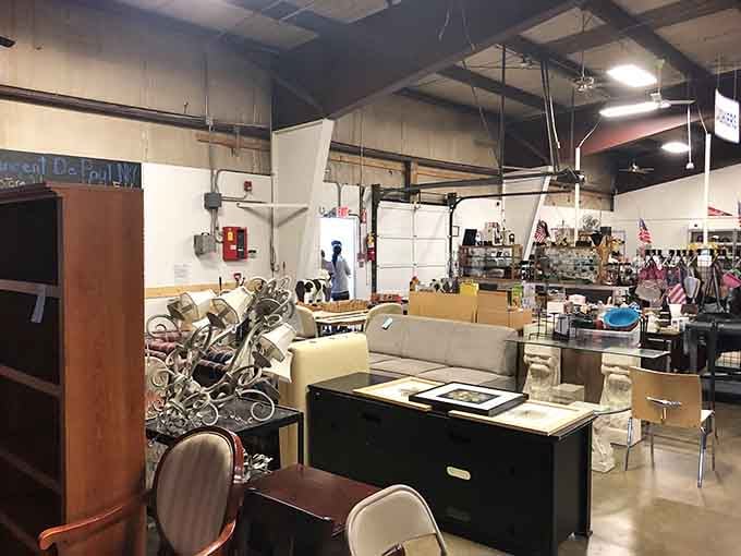 Furniture fills the space like a showroom where everything's priced like they actually want you to buy it and take it home.