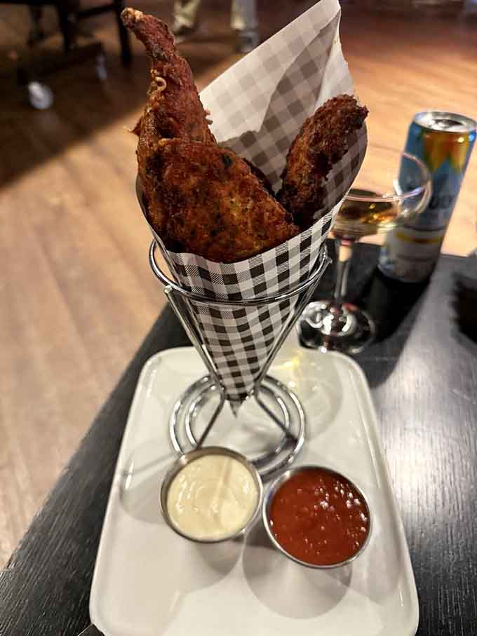 Chicken tenders served in a cone because apparently regular plates weren't fun enough for this place.
