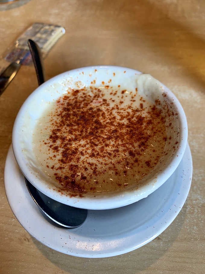 Creamy crab soup with a dusting of spice, warming you from the inside like a coastal hug.