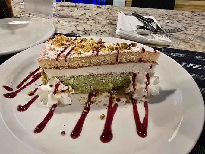 Pistachio fluff cake layered with whipped cream is the sweet ending your meal absolutely deserves tonight.