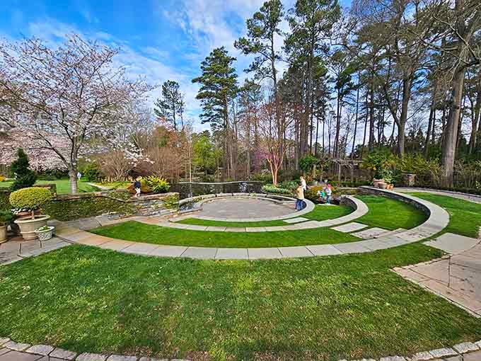 Concentric circles of green create an amphitheater where the grass itself deserves a standing ovation daily.