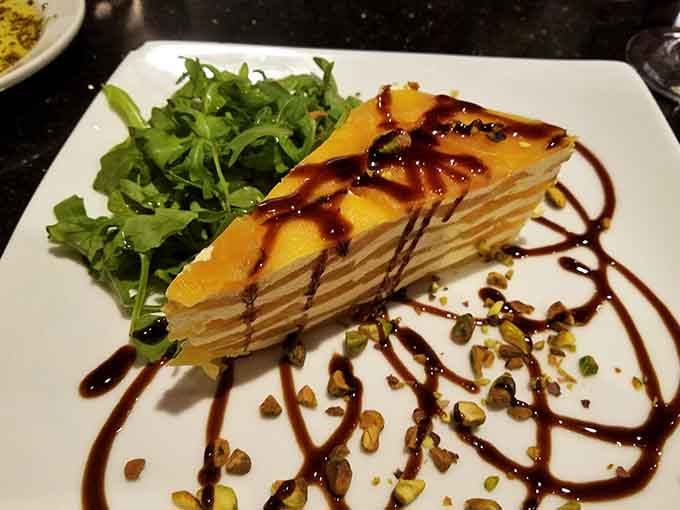 The Mille Crepe Cake stands tall with delicate layers, making every other dessert look like it didn't try hard enough.