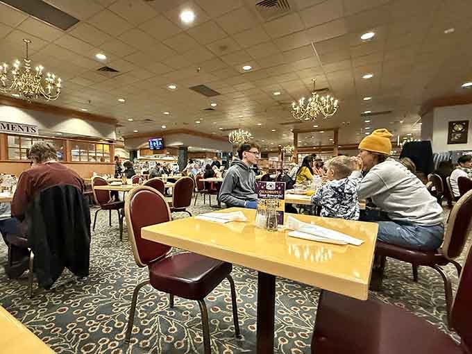 The dining room buzzes with happy eaters, all united in their quest for maximum breakfast achievement and glory.