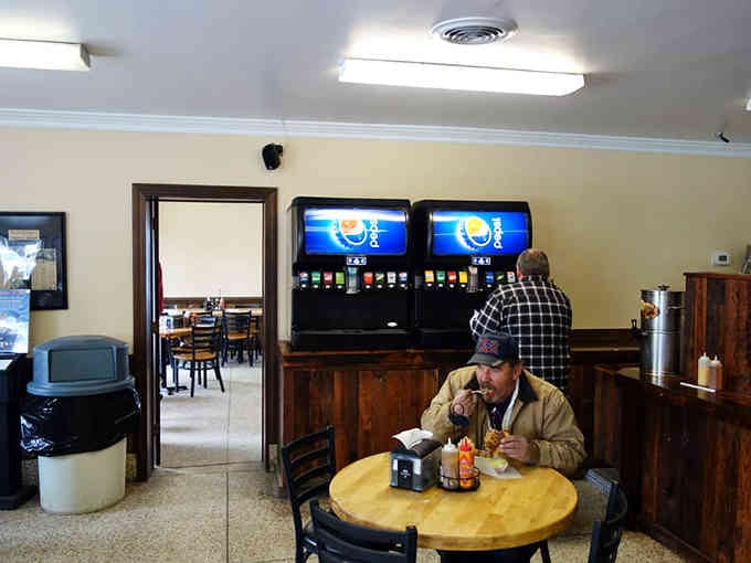 The self-serve drink station and simple seating arrangement: proof that great food needs zero distractions or pretense.