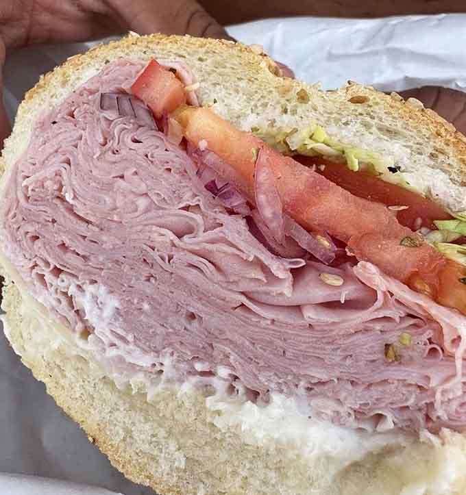 Ham stacked thick with fresh tomatoes and lettuce on a hero roll screams classic deli perfection.