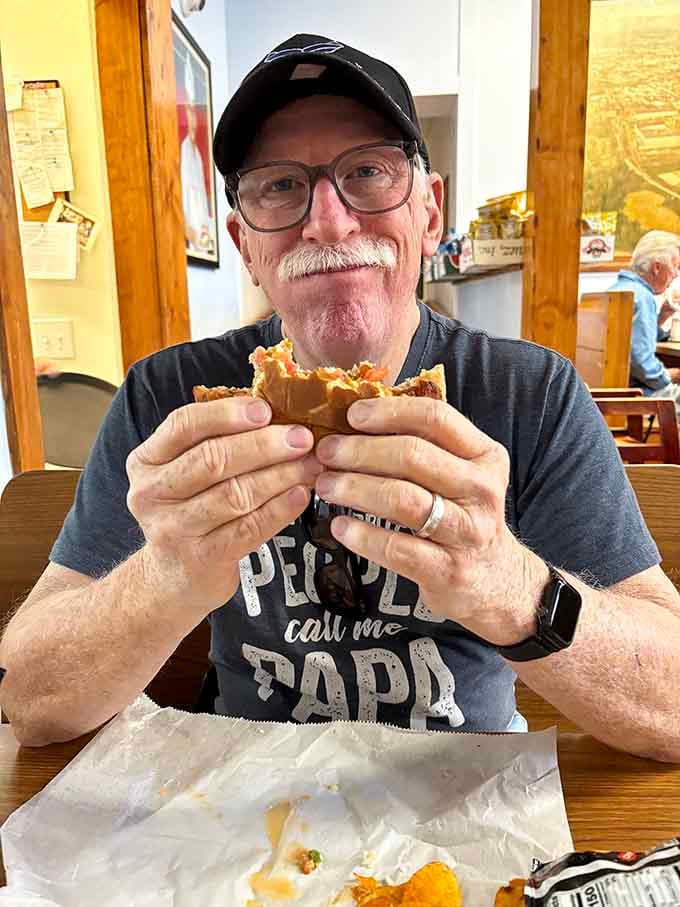 Nothing says authentic diner experience quite like a happy customer diving into that famous sandwich creation.