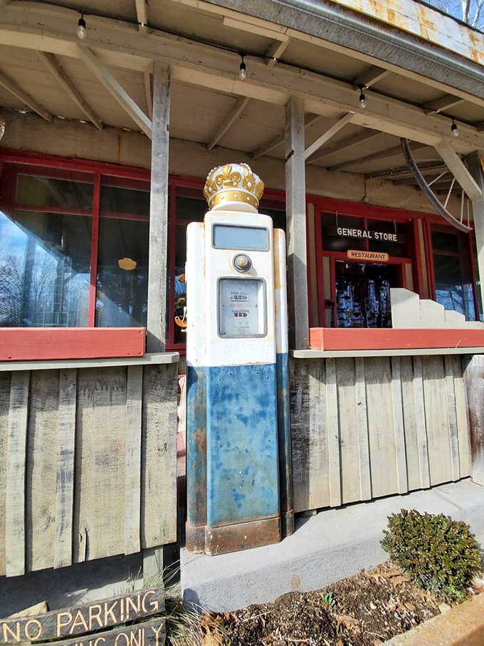 That vintage gas pump stands as a monument to simpler times when filling up meant actual human interaction.