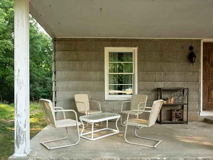 The front porch where countless pivotal scenes unfolded, now offering peaceful seating without any government conspiracy involvement whatsoever.