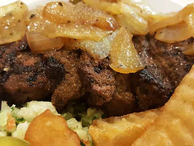 Those glistening beef tips nestled on crispy fries show that some cooks still understand the meaning of generous portions.