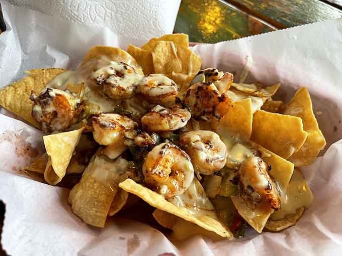 Shrimp nachos with melted cheese prove that fusion cuisine works beautifully when you're not overthinking the whole thing.