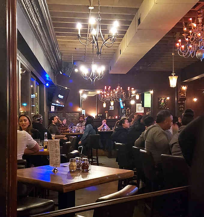 The dining room buzzes with the energy of people who've just realized they may have overestimated their appetites tonight.