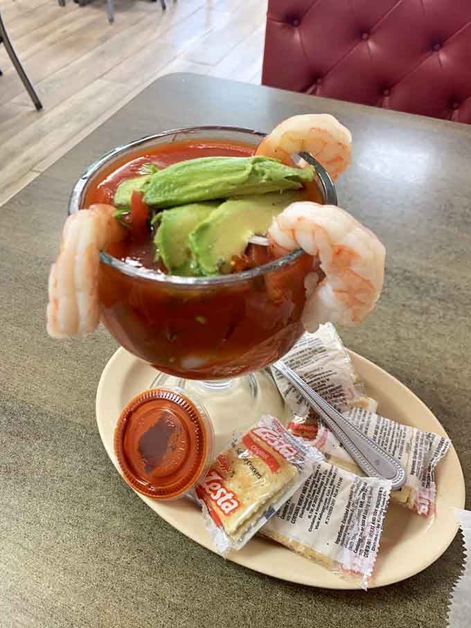 This shrimp cocktail presentation is almost too pretty to eat, with fresh avocado and tangy cocktail sauce beckoning.