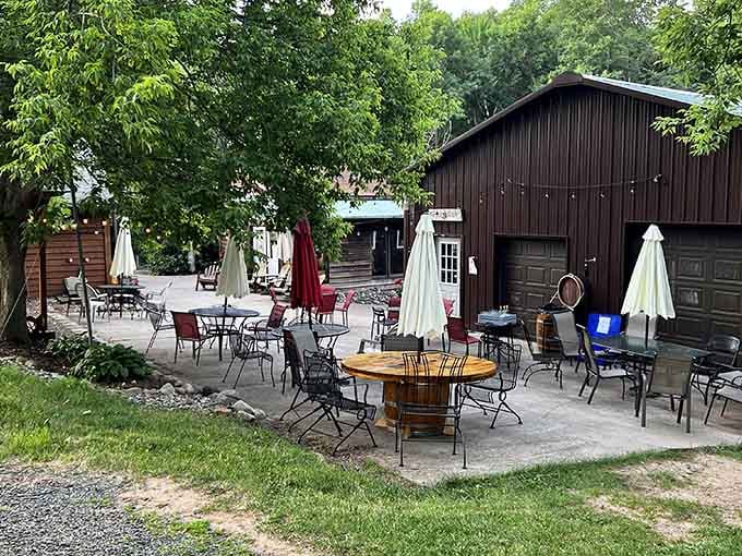 Outdoor patios where wine tastes better surrounded by trees, proving nature is the best interior designer money can't buy.