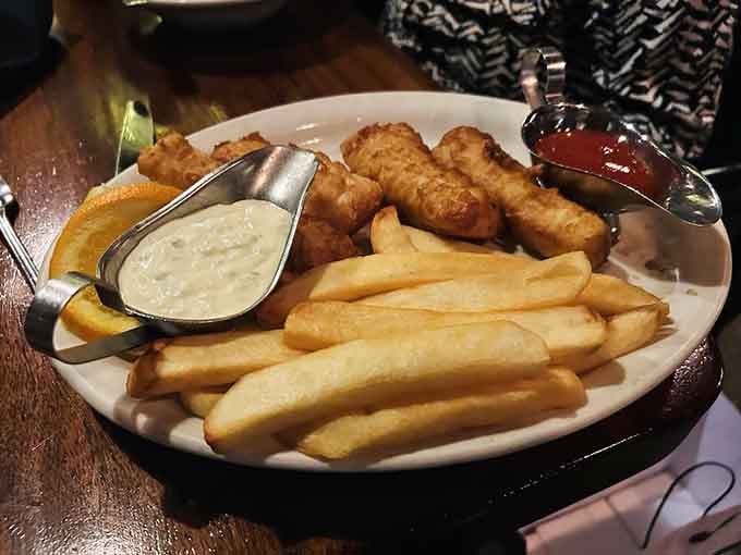 Golden fish and chips with tartar sauce prove this steakhouse knows its way around seafood too.