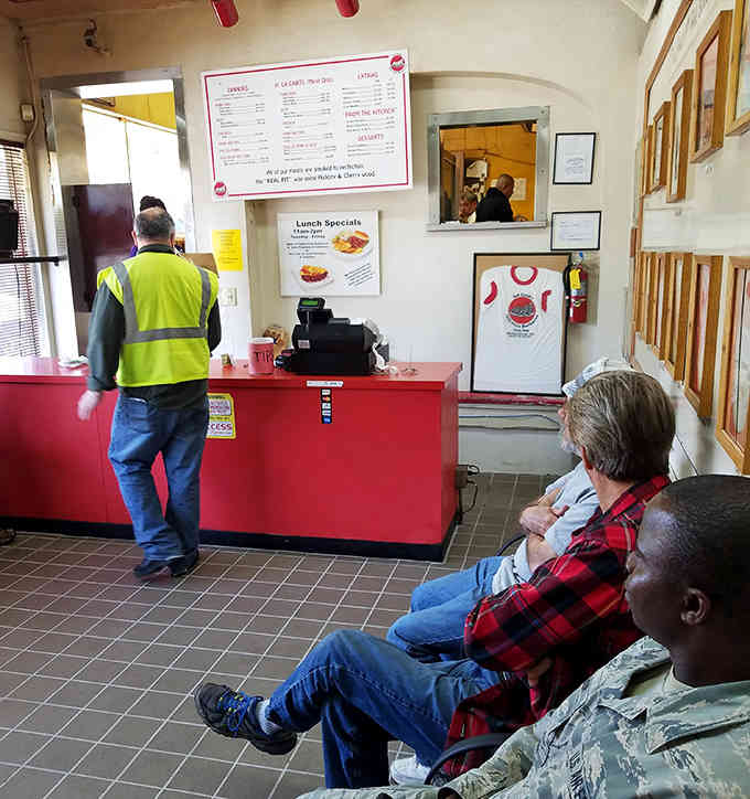 Real customers waiting patiently because good barbecue is worth every single minute of anticipation and hunger.