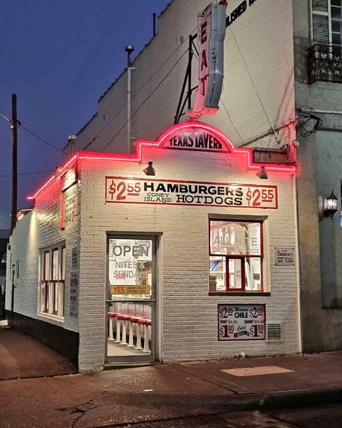 That neon glow at dusk says "we're open," but really it's saying "come find happiness in burger form."