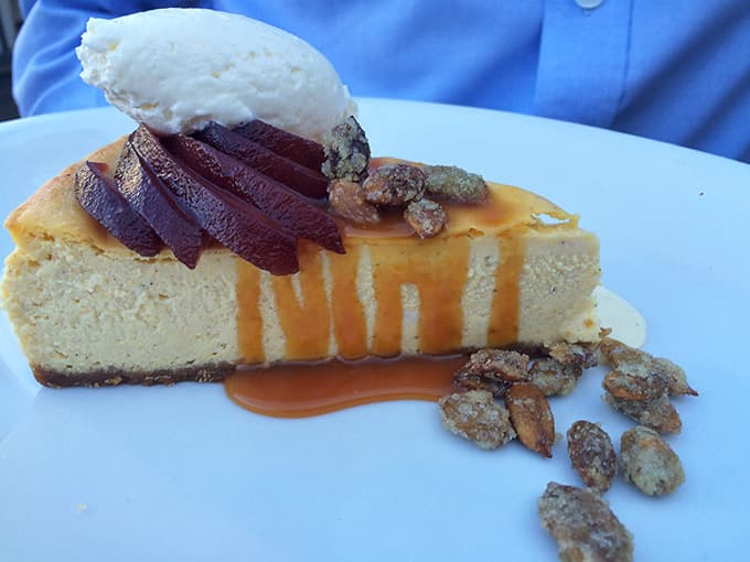 Cheesecake drizzled with caramel and topped with candied nuts, because you absolutely deserve something sweet after all that seafood.
