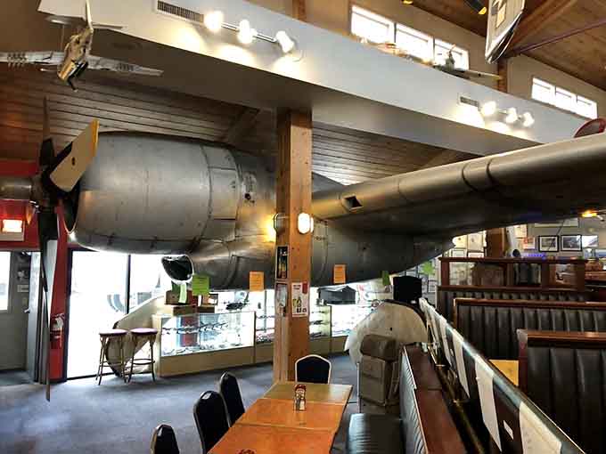 An actual aircraft engine hangs overhead like the world's coolest conversation starter and Instagram opportunity combined perfectly together.