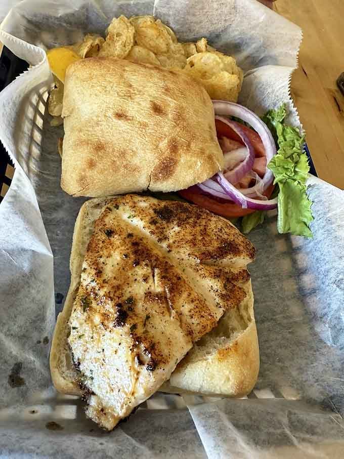 A simple grilled wahoo sandwich served waterside reminds you why Florida fishing communities have always understood fresh seafood best.