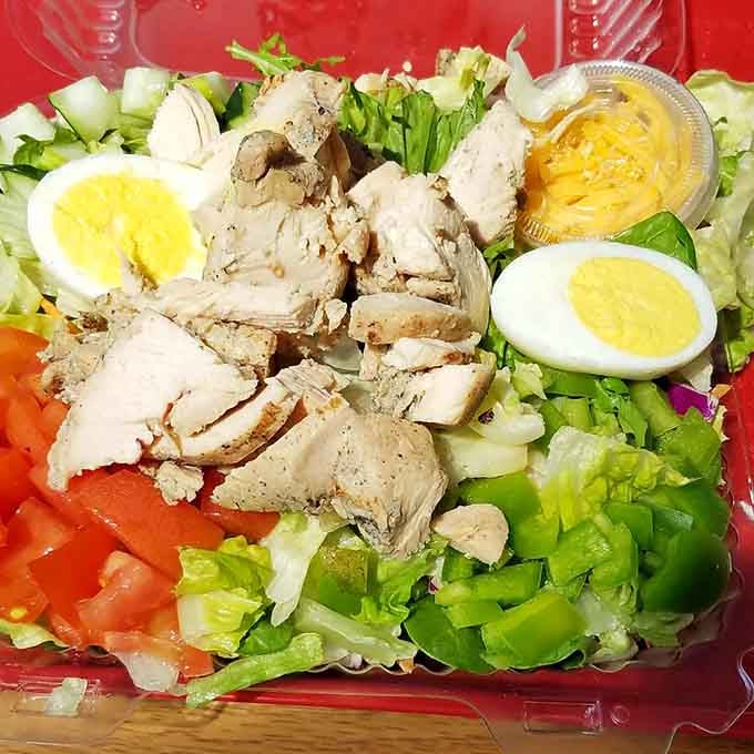 Even the salads here come loaded with protein and eggs, because apparently moderation isn't part of the local vocabulary.