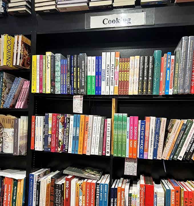 Cookbook shelves organized by cuisine type, because even your reading should make you hungry for dinner tonight.