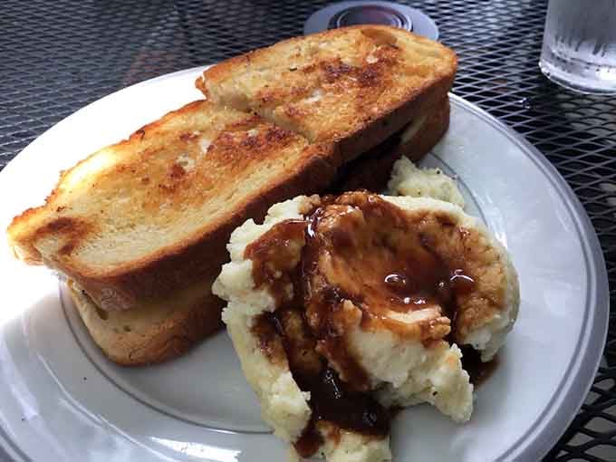 Meatloaf sandwich with mashed potatoes delivers the kind of comfort that makes everything feel right with the world.