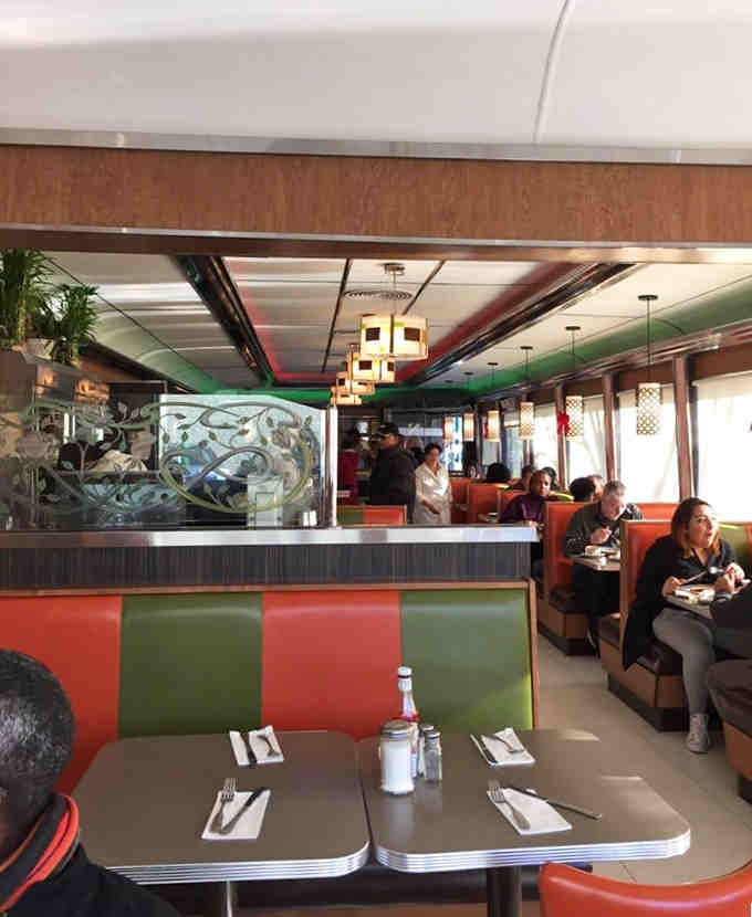 Diners filling booths on a regular morning, proof that good breakfast creates its own loyal following naturally.