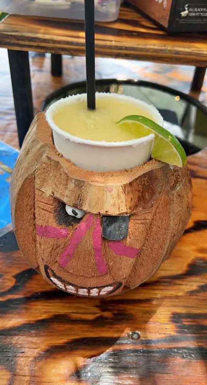 That coconut cup has more personality than most people you'll meet, and it's holding a margarita too.